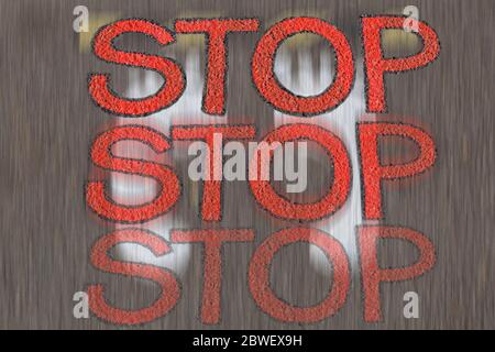 Stop sign with blurred footprints on pavement at Poole, Dorset UK in ...