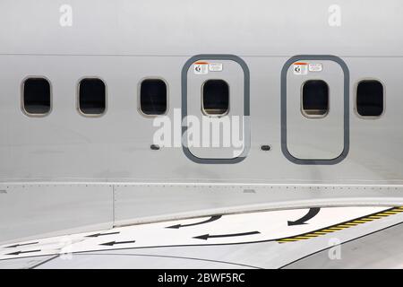 Overwing emergency exits Stock Photo - Alamy