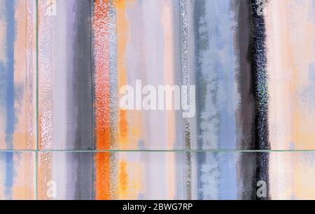 Matte ceramic tiles with multi-colored patterns. Tile background for ...