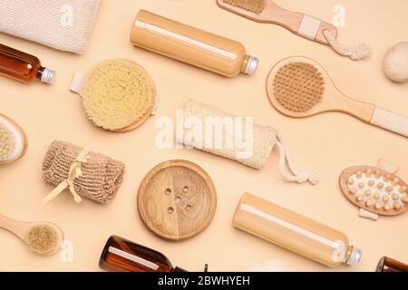 Shower gels with bath supplies on color background Stock Photo - Alamy