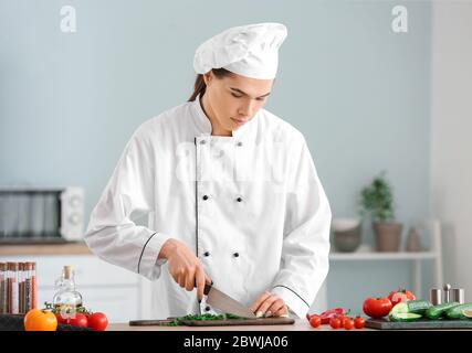 Transgender chef cooking in kitchen Stock Photo - Alamy