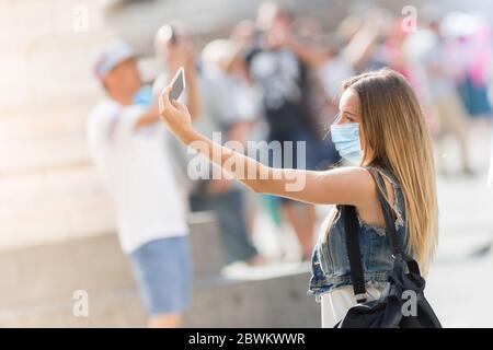 Pretty blonde woman taking a Covid-19 / SARS-CoV-2 swab test during ...