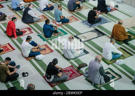 Wolfsburg, Germany. 29th May, 2020. Believers pray with the necessary ...