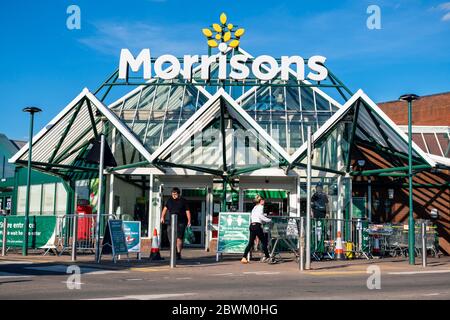 Morrisons supermarket sign with blue sky in Nelson, Lancashire Stock ...