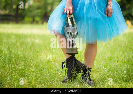 Beautiful elegant woman standing in a park in autumn Stock Photo - Alamy
