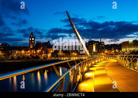 Aerial view of the Derry Peace Bridge on the river Foyle in Northern ...