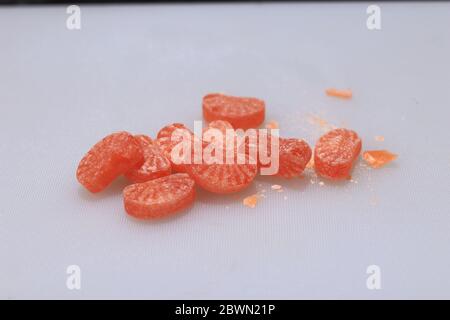 Famous orange color candy or peppermint in India Stock Photo - Alamy