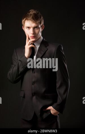 Very satisfied man in a tuxedo Stock Photo - Alamy