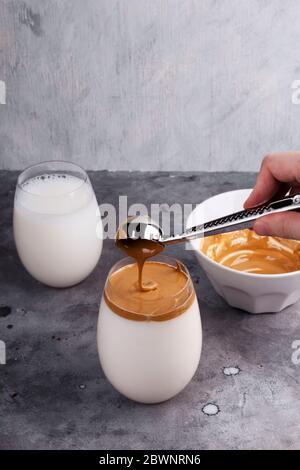 Cooking a popular Korean Dalgon coffee step by step. Pour milk into ...