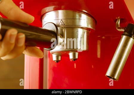 Red retro style coffee machine with latte glass close up Stock Photo ...