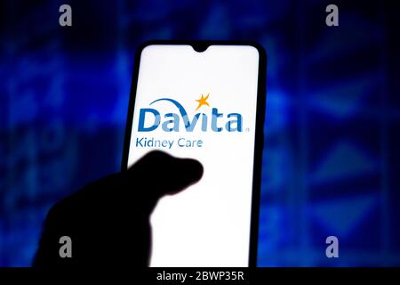 In this photo illustration, DaVita Inc. logo seen displayed on a ...