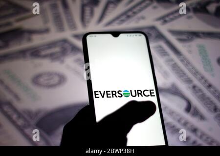 In this photo illustration, the Eversource Energy logo is displayed on ...