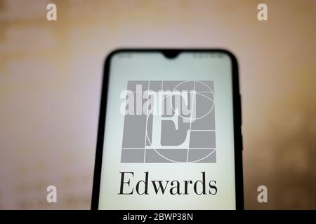 In this photo illustration, the Edwards Lifesciences logo is displayed ...