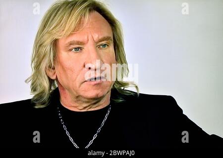 Joe Walsh of the rock band "The Eagles," left, one of the five ...