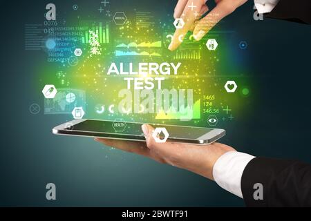Close-up of a touchscreen with ALLERGY TEST inscription, medical ...