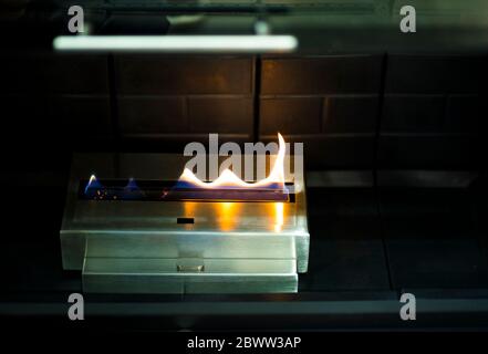 Fire behind the glass in the oven Stock Photo - Alamy