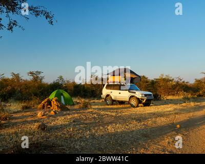 Shadow of off-road vehicle on field Stock Photo - Alamy