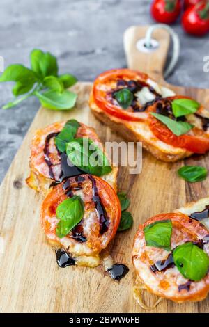Close-up of a gratinated cheese baguette Stock Photo - Alamy
