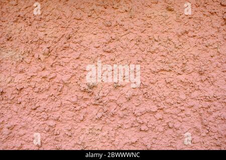 Coral stucco wall texture, peach color background. Abstract grunge ...