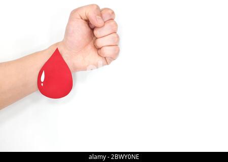 Male hands holding blood drop. Donation, anemia and transfusion concept ...