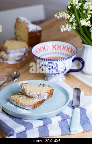bouquet of fresh lilies of the valley and retro book Stock Photo - Alamy