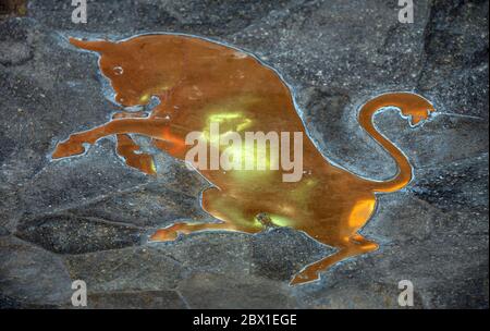 Turin city symbol - the rampant bull. In brass in the stone pavement ...