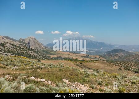 Countryside and farm fields with Limestone mountains near Alfarnate ...
