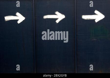 Hand with three arrows, each pointing in a different direction. Choices ...
