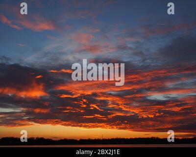 Good Versus Evil – Storm Clouds Against Sunset Clouds Stock Photo - Alamy