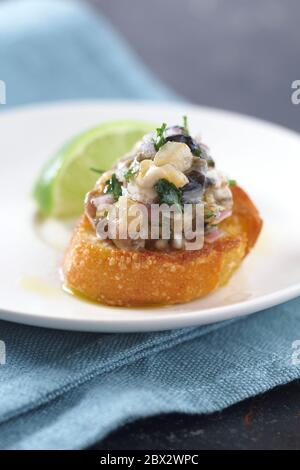 Michèle Frêné oyster and sea bream tartare Stock Photo - Alamy