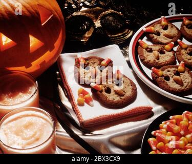 Fresh homemade decorated halloween cookies and sweets on dark ...