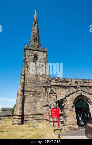 Tall stone church tower example Stock Photo - Alamy