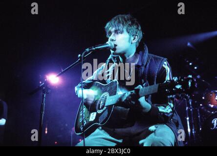 Damon Albarn lead singer of the pop group Blur lying on the floor ...