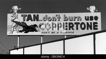 Vintage Coppertone advertising sign in Miami Florida on the side of a ...