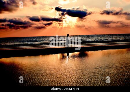 Trat, Thailand. 10th Mar, 2020. A person walks along the tropical Koh ...