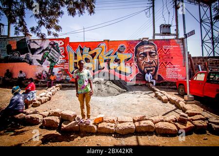 KENYA, Nairobi, Graffiti street art and traffic, colorful painted SACCO ...