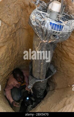 MALI, Kayes, Sadiola, artisanal gold mining at Camp SIRIMANA, winch to ...