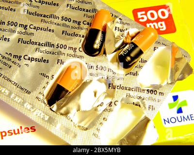 3 Flucloxacillin capsule antibiotic pills and packaging Stock Photo - Alamy