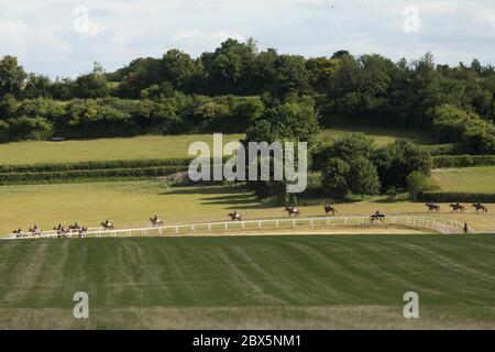 Kingsclere, Hampshire. 5th June, 2020. Riders and their horses train on ...