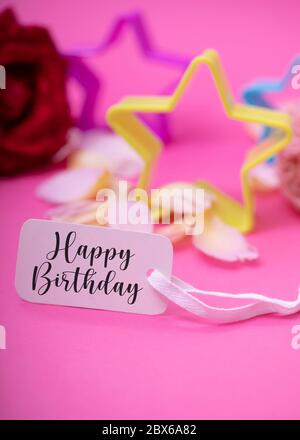 pastel colors pink candle with beautiful neutral color bow on pink ...