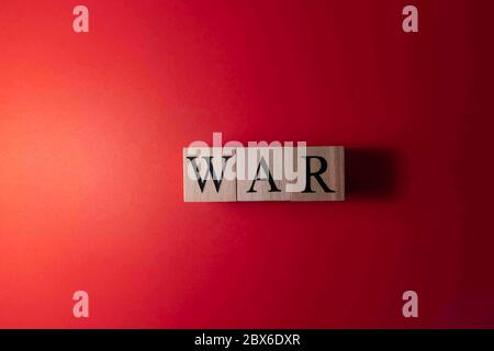 War post in red background and spot light Stock Photo - Alamy