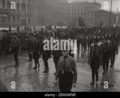The SA and SS march in Berlin under the linden trees. Heinrich Hoffmann ...