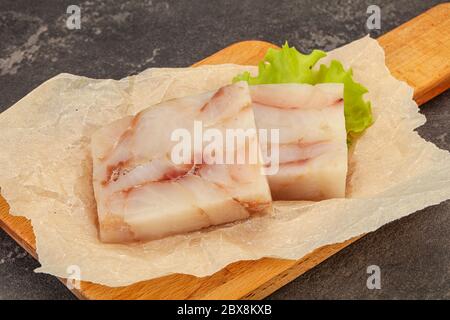 Raw dietary pollock fish fillet for cooking Stock Photo - Alamy