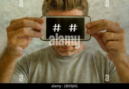networking obsession guy social media phone Stock Photo - Alamy