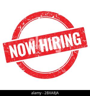 NOW HIRING red round stamp Stock Photo - Alamy