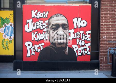 George Floyd tributes cover boarded up retail windows, Uptown ...