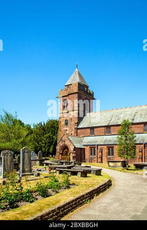 The church and churchyard gravestones of St James in the rural Cheshire ...