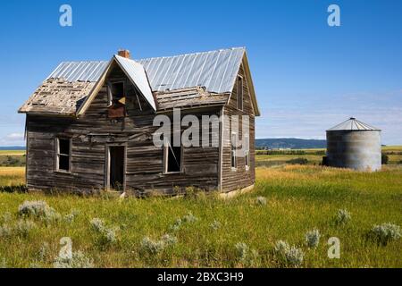 Abandoned farm house along Ashton-Flagg Ranch Road in Northeastern ...