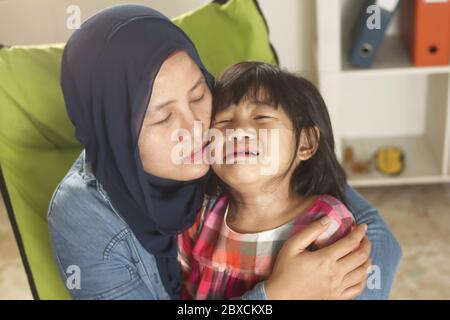 Portrait of sad Asian muslim woman wearing hijab crying, depression ...