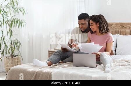 Woman calculating expences and checking savings, personal finances ...